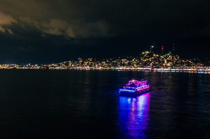 Night Party in Catamatan with Neon Lights, Live DJ and Drinks - Key Points