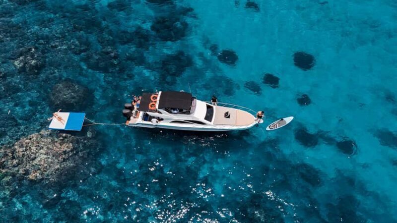 Nusa Dua: Sunset Luxury Yacht & Coral Fishing Excursion - Sunset and Relaxation on Deck