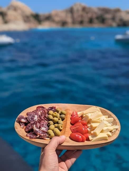 Olbia: Aperitif with Dolphin Watching & Snorkeling Boat Trip - Key Points
