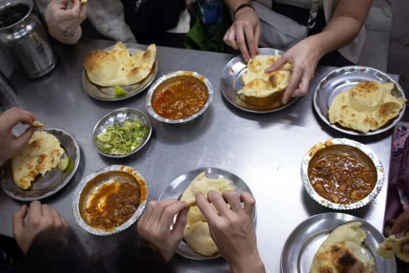 Old Delhi Food Tour: A Night Time Feast - Transport & Group Experience