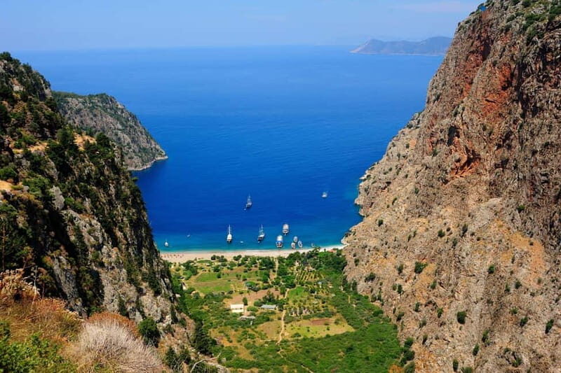 Ölüdeniz: Blue Cave, Butterfly Valley & Lunch Boat Tour - Visiting the Blue Cave: Colors That Will Take Your Breath Away