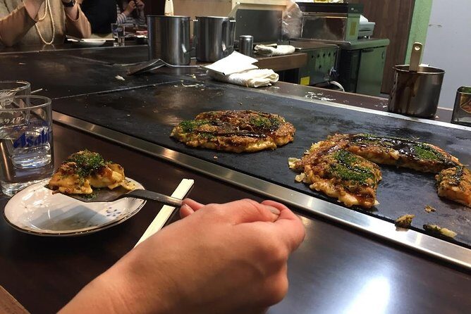 Osaka Food Walking Tour with Market Visit - Detailed Breakdown of the Tour Itinerary