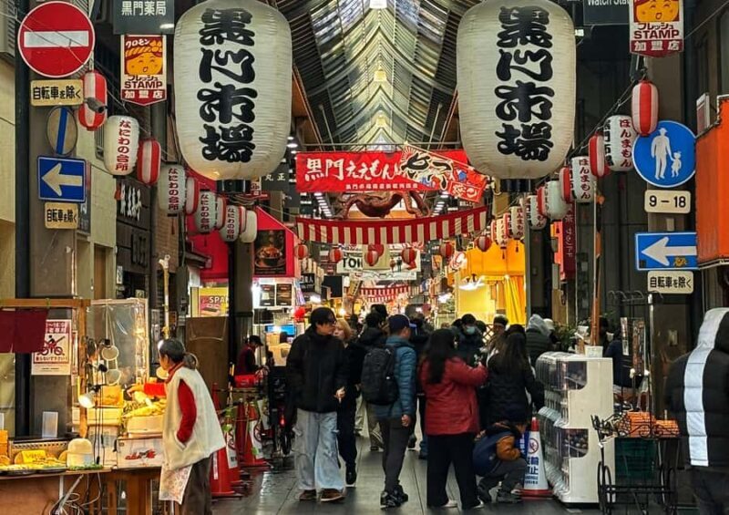 Osaka: Wagyu & Street Food Tour at Dotonbori, Kuromon, &more - Walking through Sennichimae