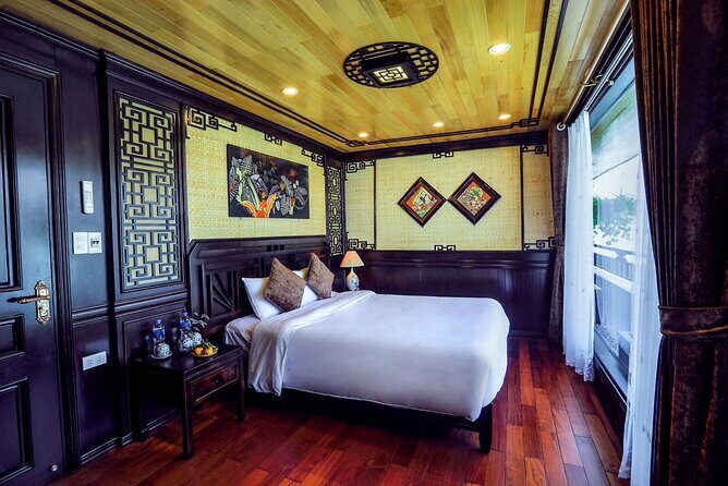 Overnight Halong Bay Cruise Including Transfer Service and Kayaking or Bamboo Boat Activities - Detailed Tour Breakdown