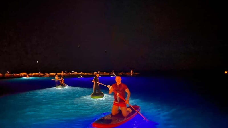 Paddle surf at night with light & drink -photos &videos - Key Points