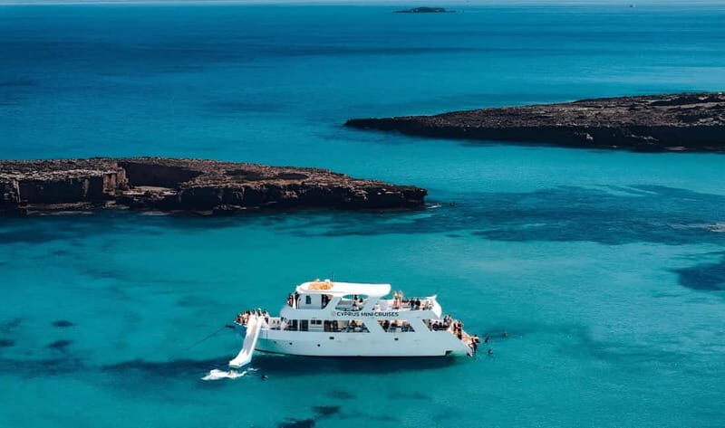 Paphos: Blue Lagoon Sunset Cruise, BBQ & Wine + Water Slide - Key Points