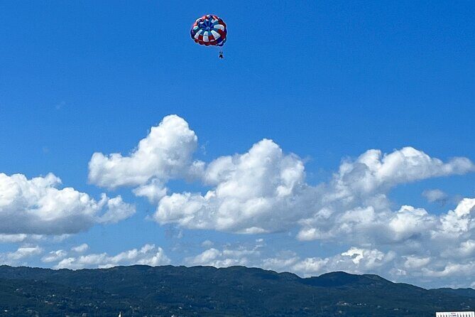 Parasailing above Turquoise Ocean Waters in Montego Bay - The Sum Up