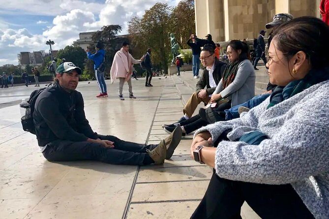 Paris Top Sights Half Day Walking Tour + Wine Tasting Experience - Transport and Group Dynamics