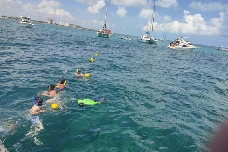 PDC: Isla Mujeres Catamaran Tour with Snorkeling - Key Points