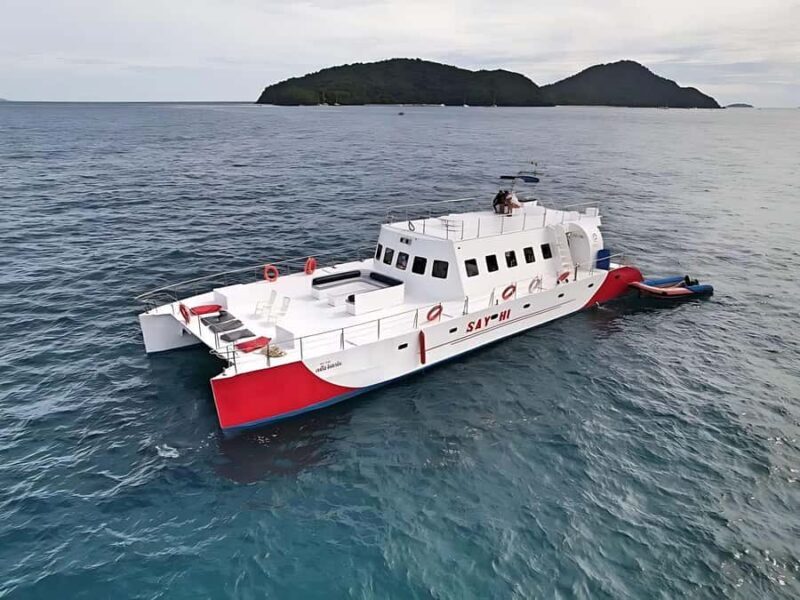 Phuket: Coral Island by Catamaran Yacht with Sunset Dinner - Scenic Return to the Mainland and the Sunset at Promthep Cape