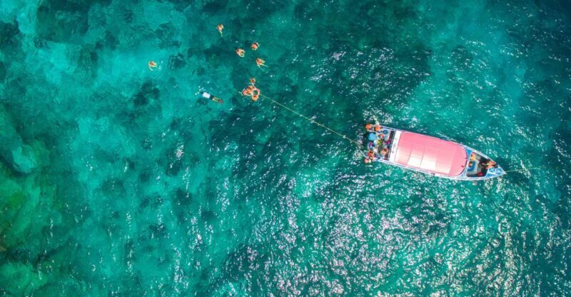 Phuket: Coral Island Longtail Boat Cruise with Snorkeling - Snorkeling in Vibrant Waters