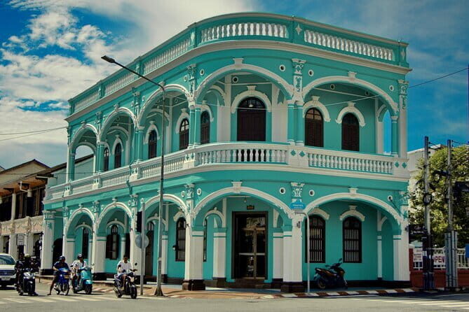 Phuket Landmark City Tour with Local Food Market Experience - A Deep Dive into the Experience