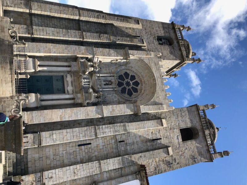 Porto: Guided City Walking Tour & Port Wine Cellar - The Sum Up