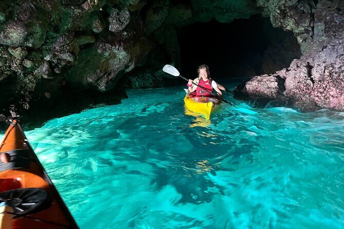 Porto Selvaggio kayak tour + cliff diving + cold spring immersion - The Guide and Group Experience