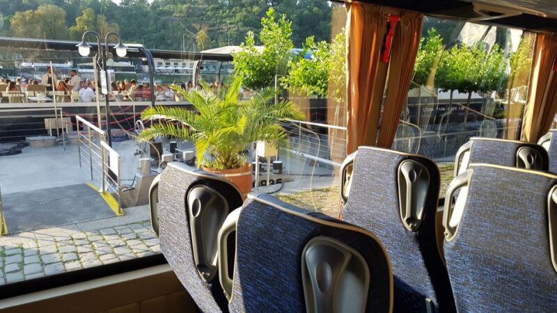 Prague: City Tour and Dinner Cruise with Hotel Pickup - Dining on the Water: Buffet, Music, and Atmosphere