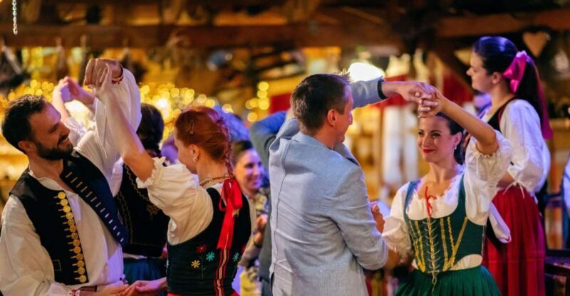 Prague: Folkloric Dinner Show with Unlimited Drinks - Unlimited Drinks and the Social Ambience