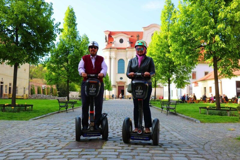 Prague: Grand Segway and eScooter Live Guided City Tour - Riding Through Historical and Modern Neighborhoods