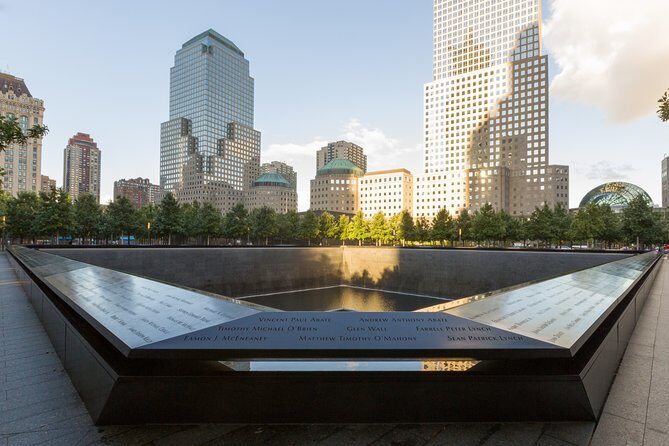 Private 4-hour Walking Tour Downtown and 9/11 Memorial Tour in NY - Wall Street: The Financial Heartbeat of the City