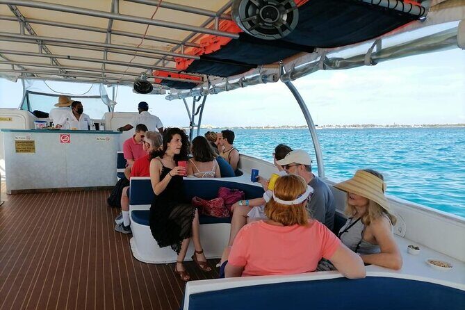 Private Boat to Isla Mujeres with Open Bar from Playa del Carmen - The Sum Up