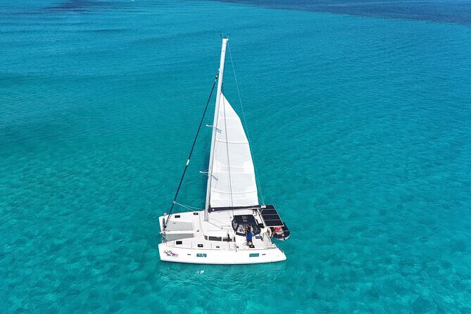Private Catamaran Tour Super to Isla Mujeres - Setting the Scene: A Private Day on the Caribbean Waters