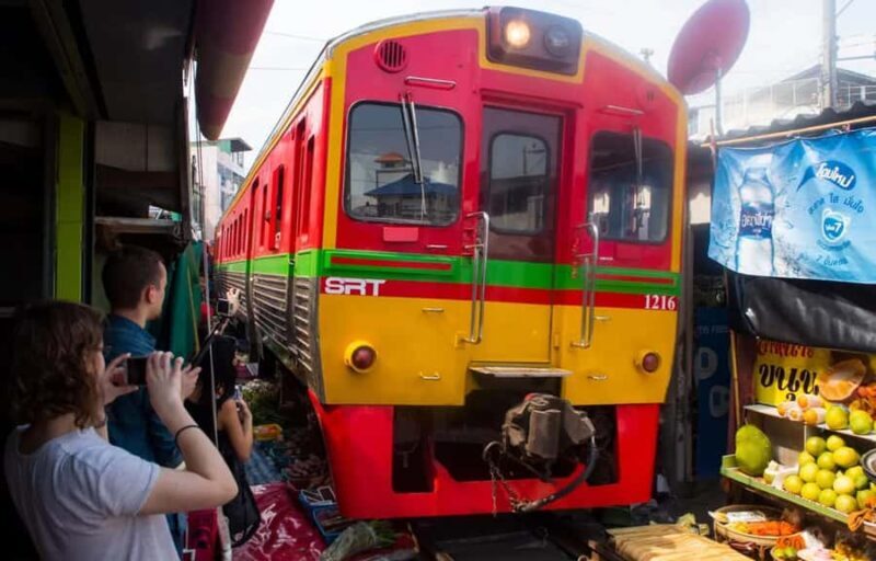 Private: Damnoen Saduak Floating Market, Railway, Wat & More - Maeklong Railway Market: The Train Comes Through