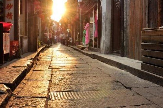 Private Fengjing and Xitang Water Town Sunset Boating Tour with Dinner from Shanghai - Key Points