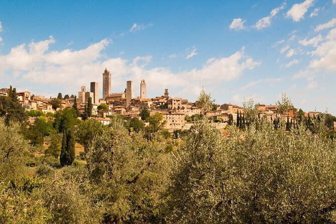 Private Guided E-bike Tour of San Gimignano with Wine Tasting - Discovering San Gimignano and Its Environs