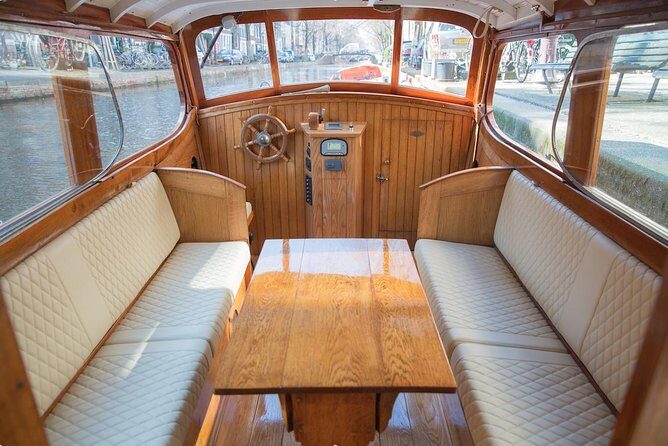 Private Guided Historic Amsterdam Canal Cruise in a Salon Boat - Discovering Amsterdam by Water: A Detailed Look at the Canal Cruise
