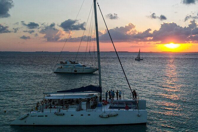 Private Isla Mujeres Sailing Catamaran Tour with Transportation - Island Arrival and Free Time
