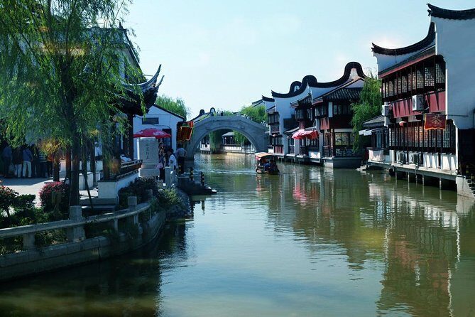 Private Shanghai Layover Tour to Zhaojialou Water Town with City Highlights - How the Day Unfolds