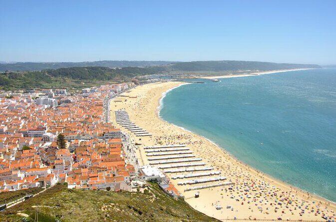 Private Tour: Discovery Fishing Village of Nazaré and the Giant Waves with Traditional Lunch - Key Points