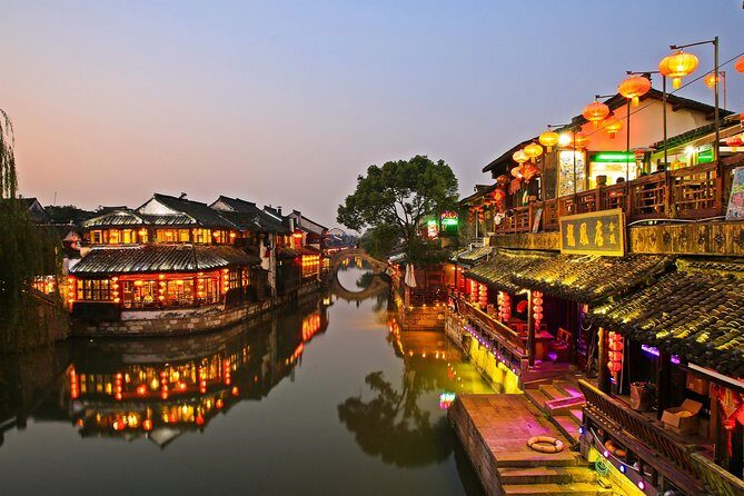 Private Tour to Xitang and Liantang Water Town from Shanghai with Dinner and Boat Ride - Sunset and Nighttime Charm in Xitang