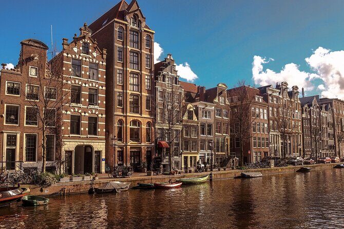 Private transfer from Bruges to Amsterdam, 2h Stop in Utrecht - The Transportation Experience