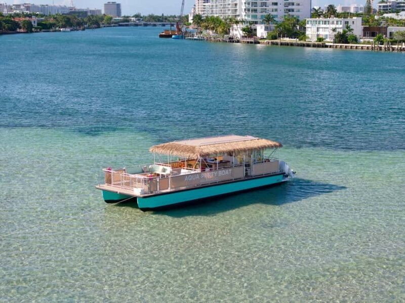 Raccoon Island Adventure: Swim & Luxury Waterfront Estates - Key Points