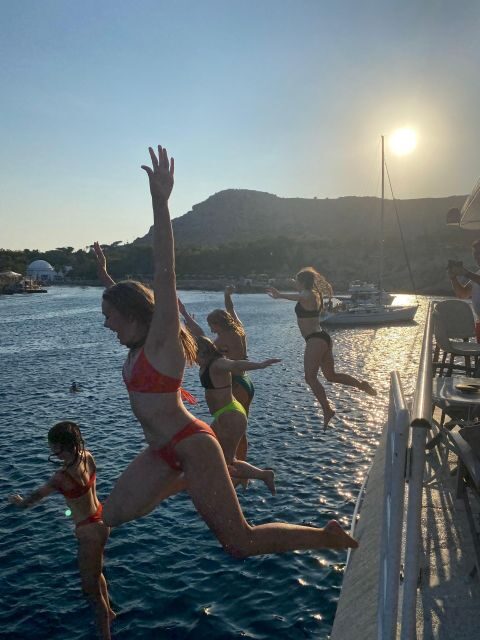 Rhodes: Bay to Bay Swim Cruise with Greek Buffet and Wine - Key Points