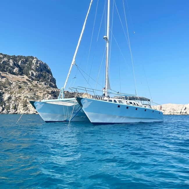 Rhodes: Catamaran Cruise with Meal, Snacks & Swim Stops - An Authentic Day on the Water