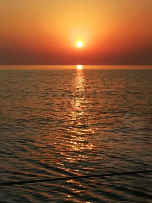Rhodes: Sunset Catamaran Cruise with Snack, Fruits & Drinks - Additional Onboard Features