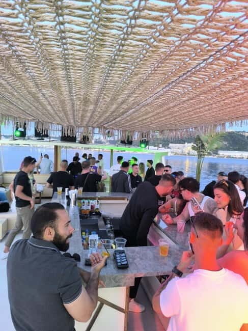Rhodes: Weekend Sunset Live DJ Boat Party with Free Transfer - Key Points