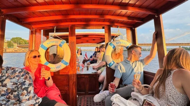 Riga: Canal Boat Tour with Welcome Drink & Audio Guide - Key Points