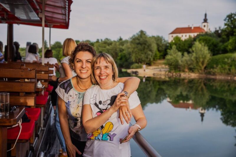 Riverboat tour by replica of a traditional itna laa boat - The Sum Up