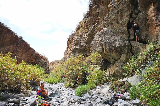 Rock climbing in natural space. - The Sum Up