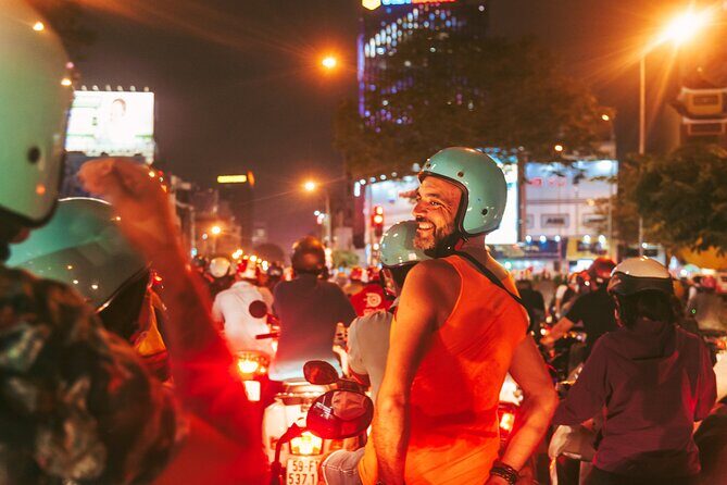 Saigon After Dark Night Tour by Scooter + 7 tastings - Experience Ho Chi Minh City After Dark on a Scooter Tour