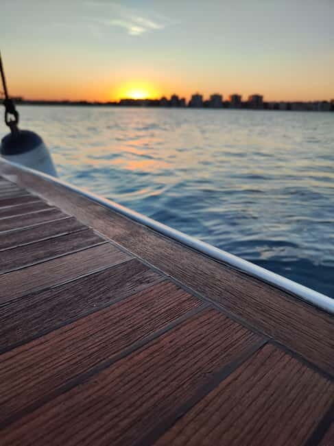 Sailing with sunset and swim in the sea - Key Points