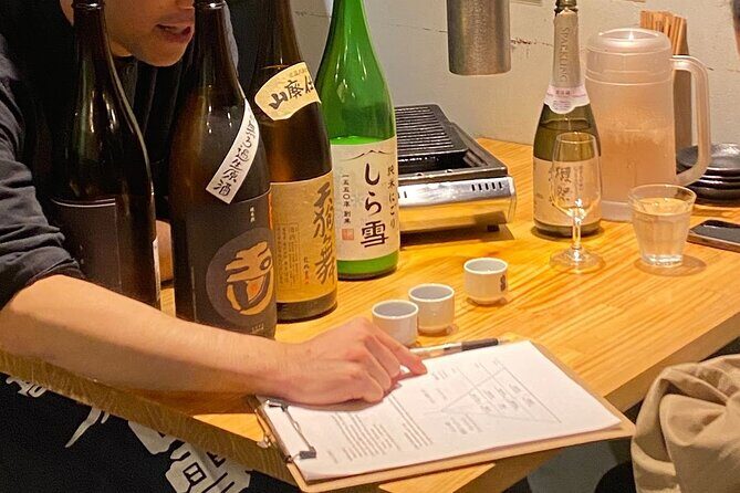 Sake Tasting and Japanese Calligraphy Experience - Key Points