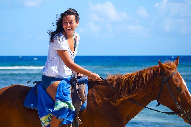 Sand n Saddle Horseback Ride & Swim Tour from Runaway Bay - FAQ