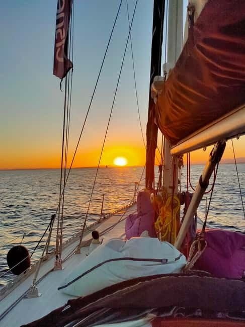 Santa Pola: Sailboat trips to Tabarca, snorkeling, and sunset with tasting - The Sum Up