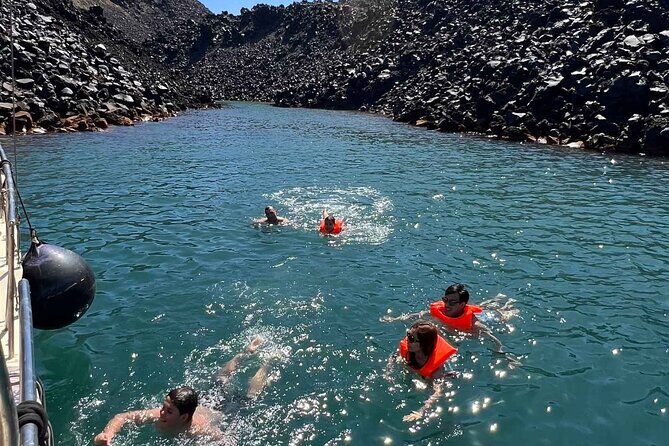 Santorini: Boat tour to Volcano, Hot Springs & Thirasia island - Key Points