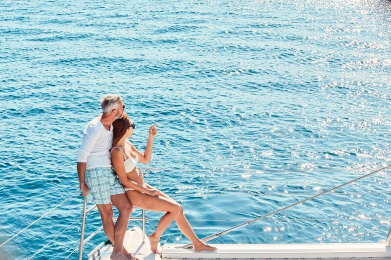 Santorini: Catamaran Tour with BBQ Meal and Unlimited Drinks - Key Points