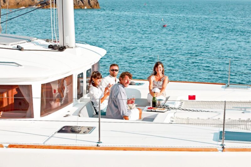 Santorini: Catamaran Tour with BBQ Meal and Unlimited Drinks - What Sets This Tour Apart