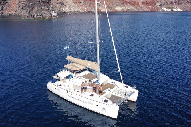 Santorini Gold Catamaran Cruise with BBQ, Drinks and Hotel Pickup - Comfort and Convenience Onboard